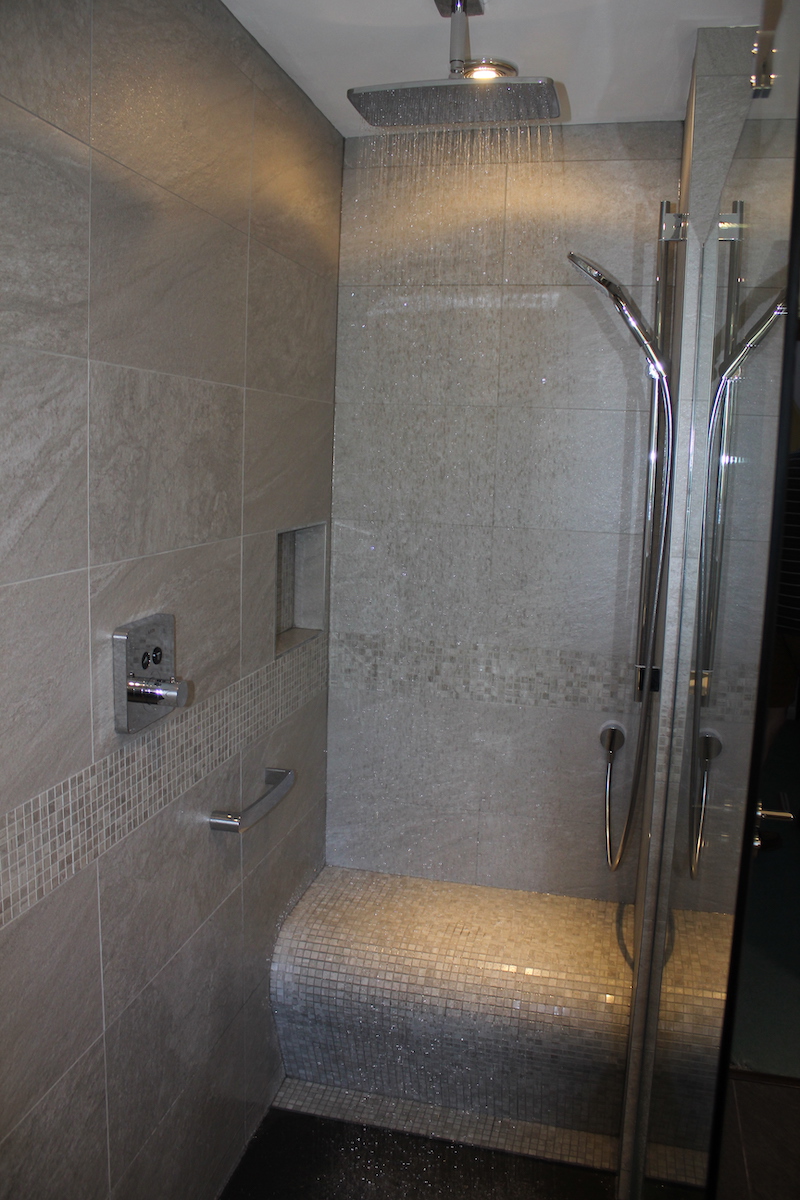 Bathroom with mosaic shower seat | Interiors 12