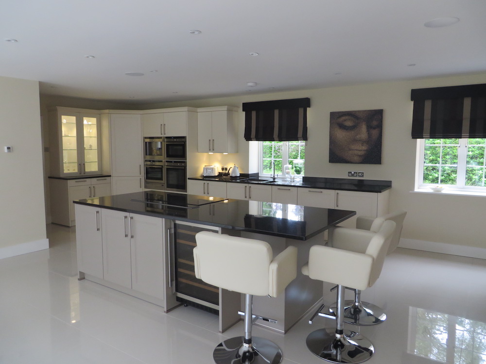 Ivory kitchen with star galaxy granite | Interiors 12